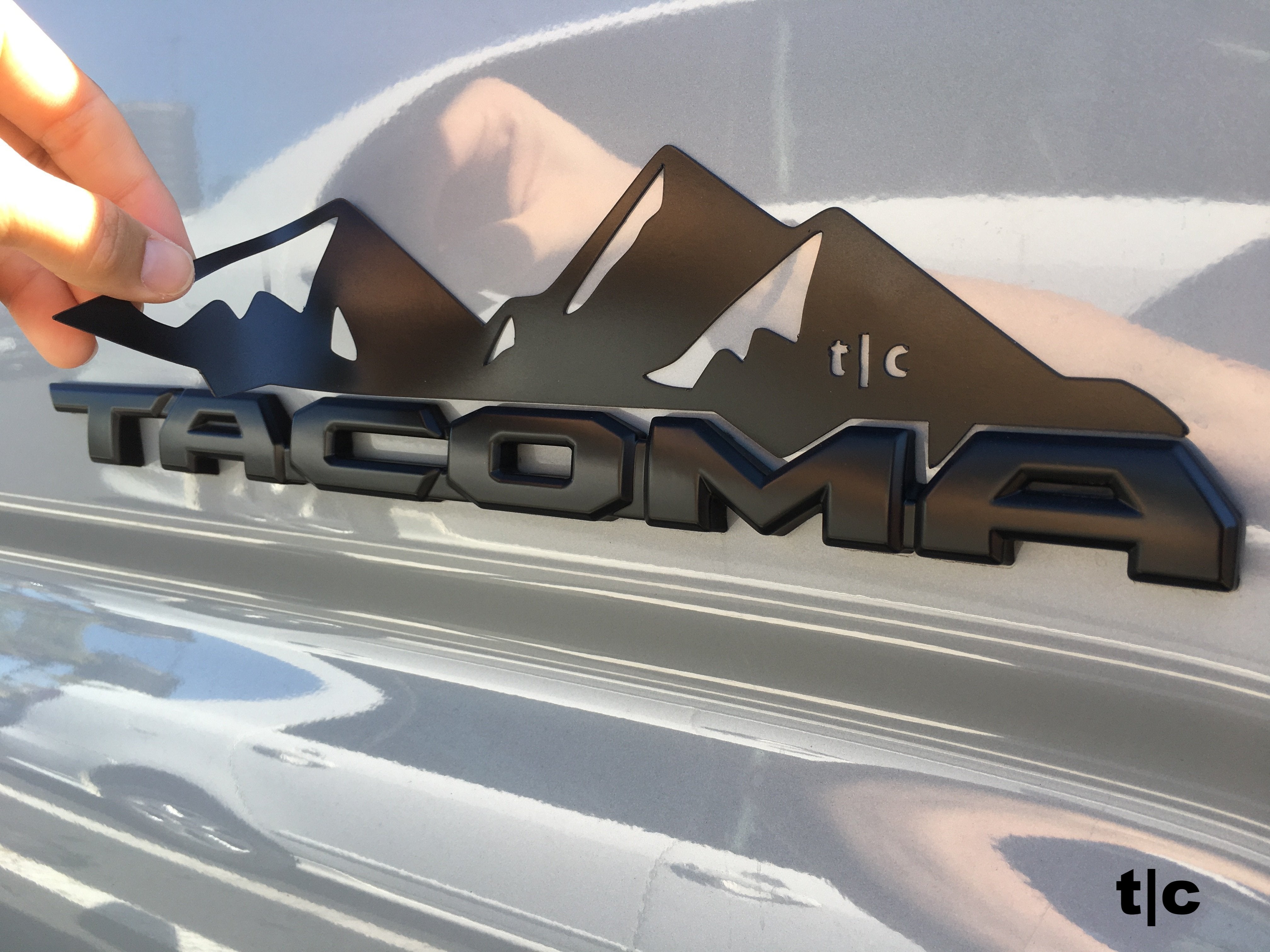 Shop Toyota Tacoma Badge Mountain Range Magnet 2016+